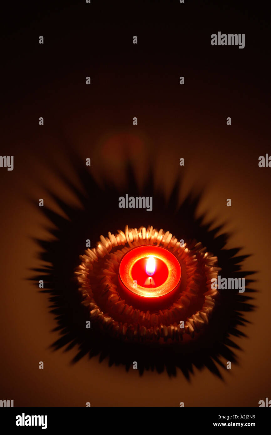 Candle light casting shadow hi-res stock photography and images - Alamy