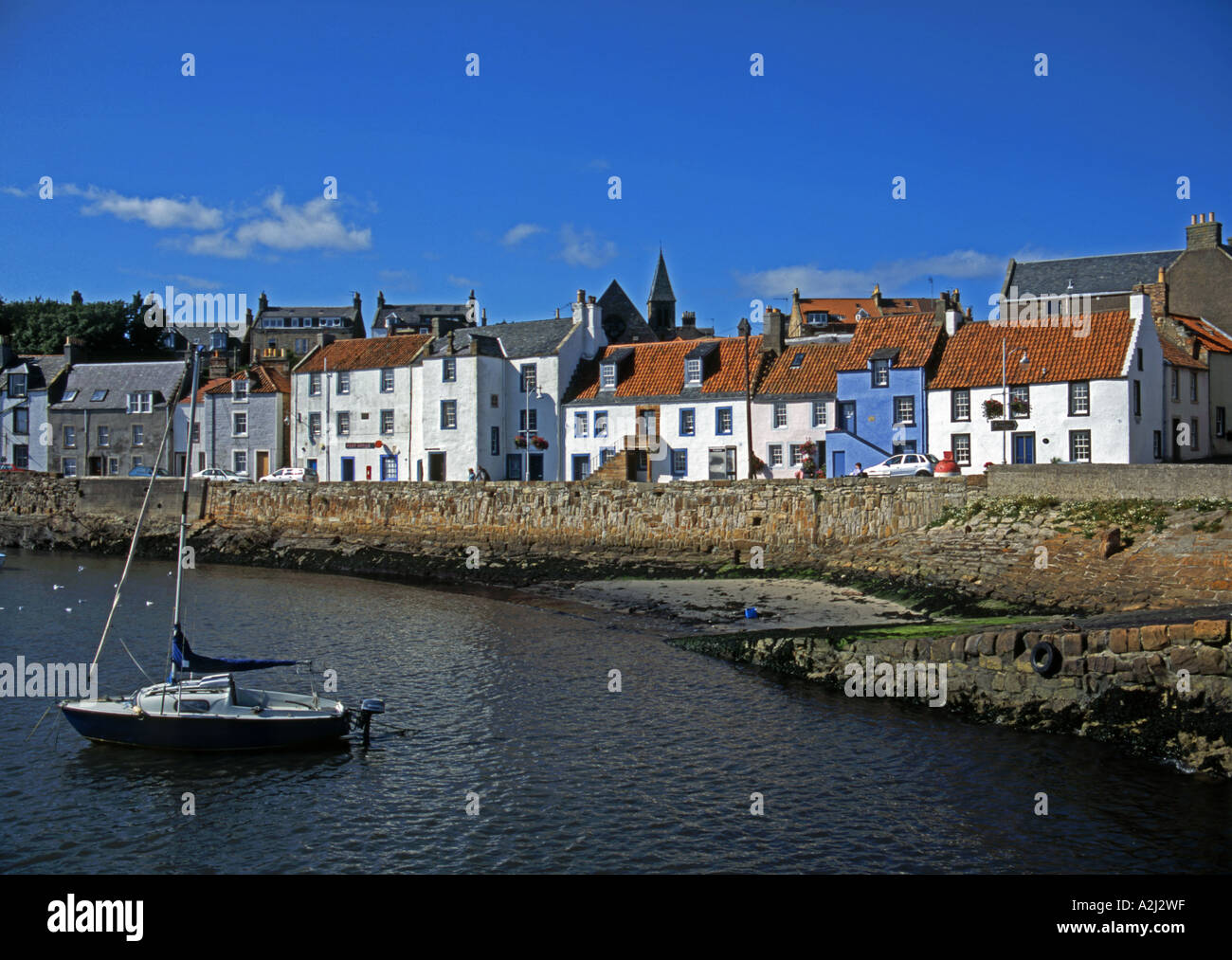 Traditional houses along the quay side in St Monans harbour Fife ...