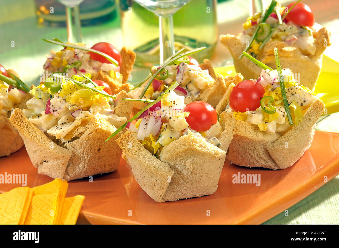 Toast Baskets with Salad Stock Photo - Alamy