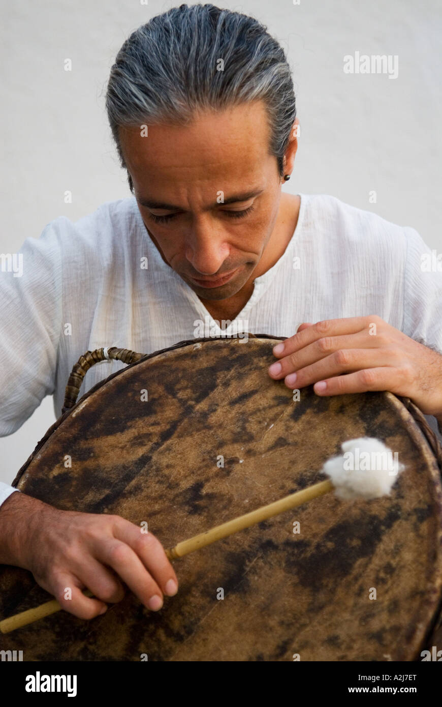 musician plays large african drum Stock Photo - Alamy