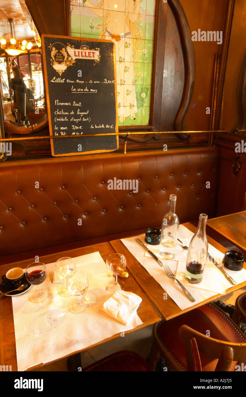 A lunch dining table after the meal is finished over. Empty glasses and ...