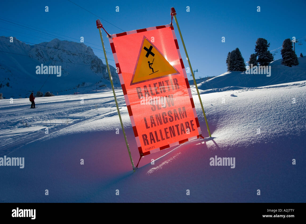 Slow sign for skiers crossing a ski tow track in the alps Stock Photo ...