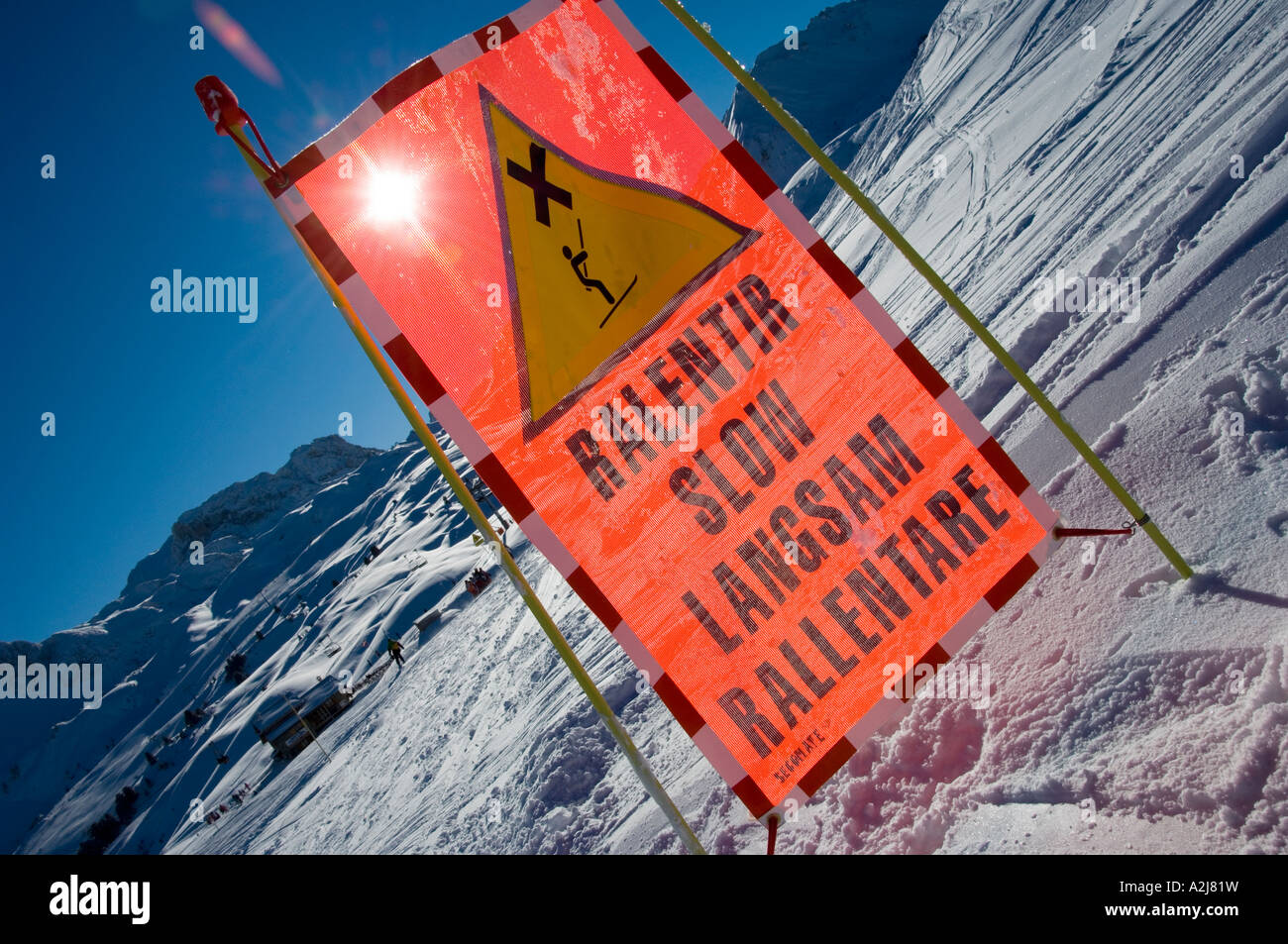 Red slow warning sign on ski piste hi-res stock photography and images ...
