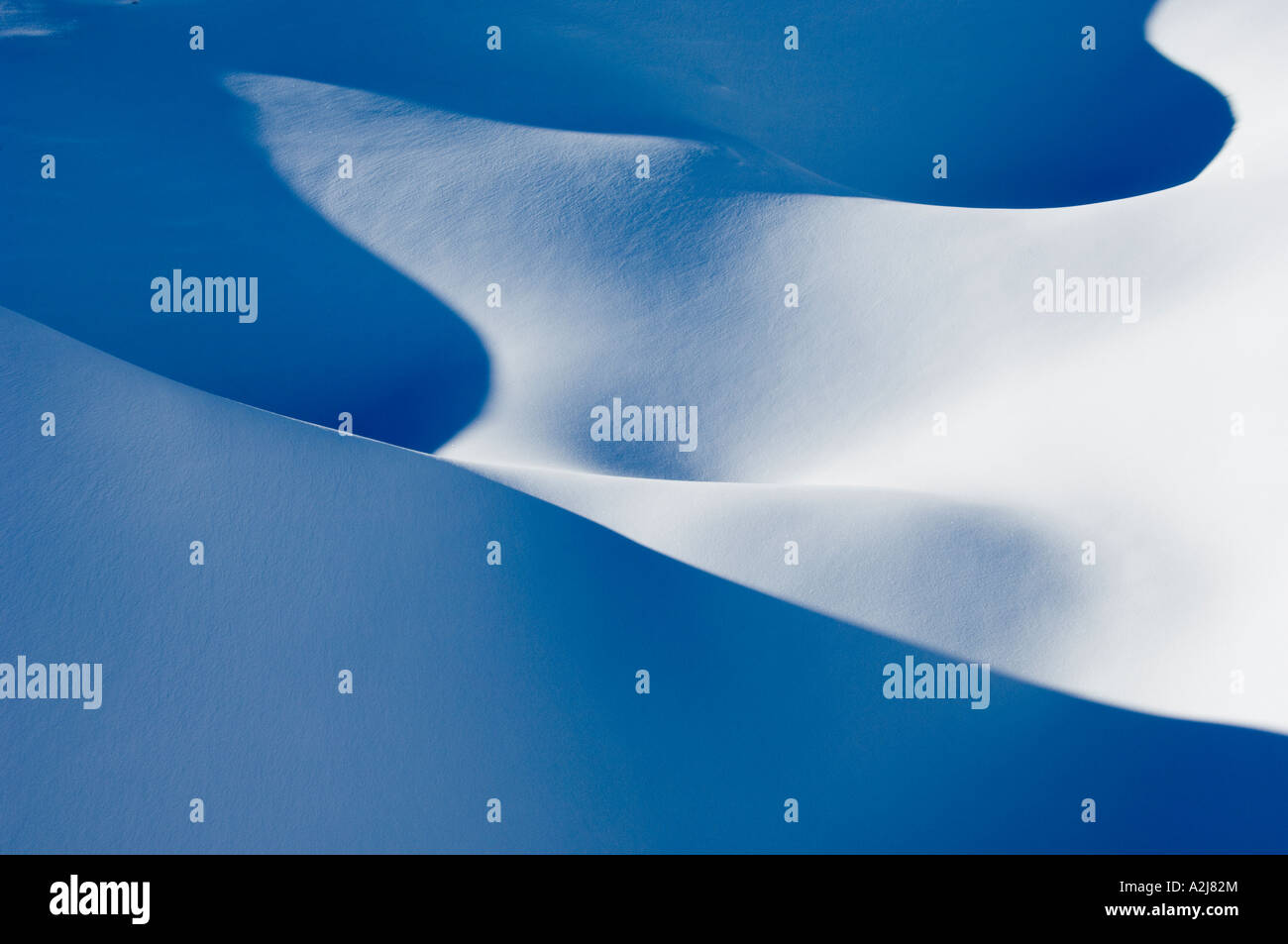 Winter landscape with undulating snowfield Stock Photo - Alamy