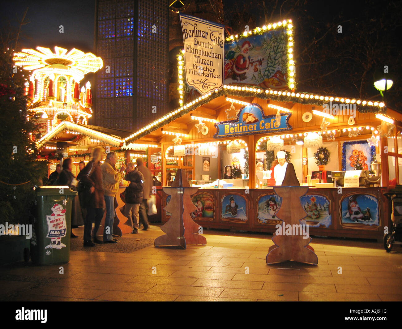 Berliner cafe at Christmas market at dusk near Gedachtniskirche Berlin ...