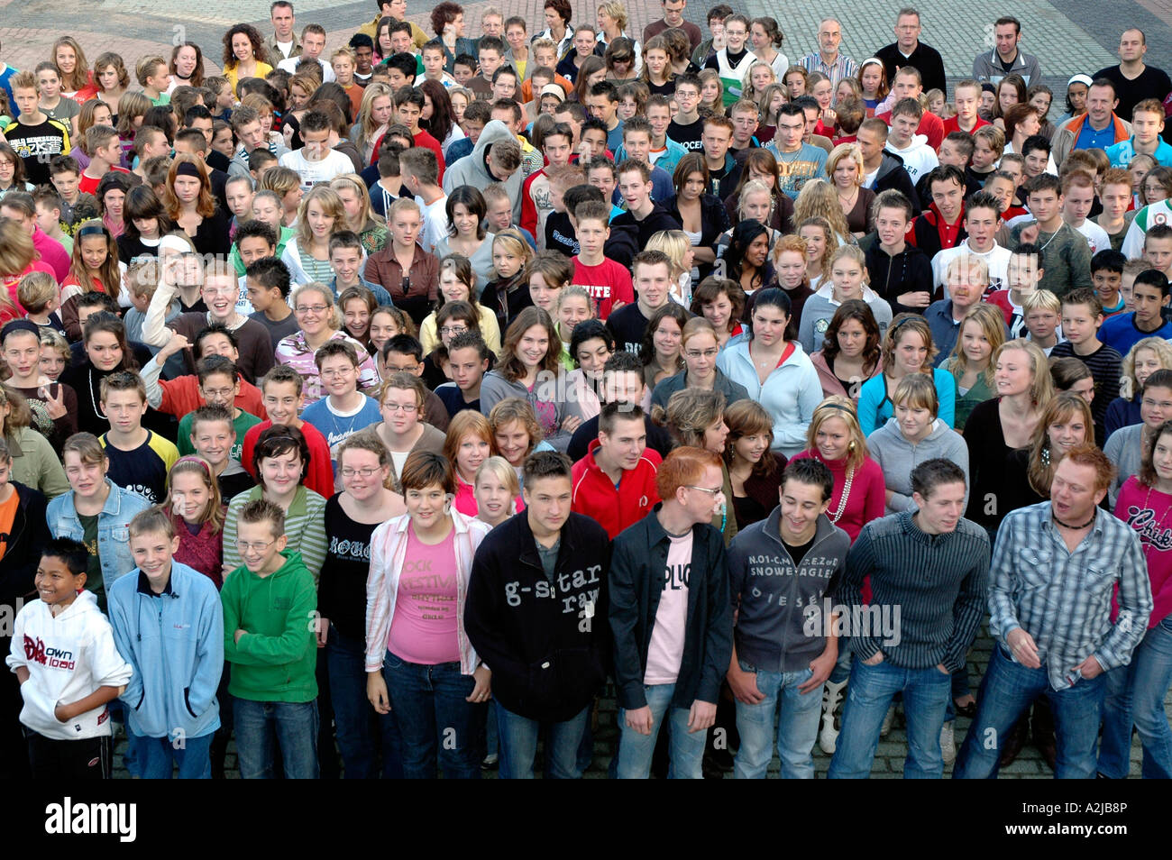 Large group of secondary school children looking up at the camera Stock ...