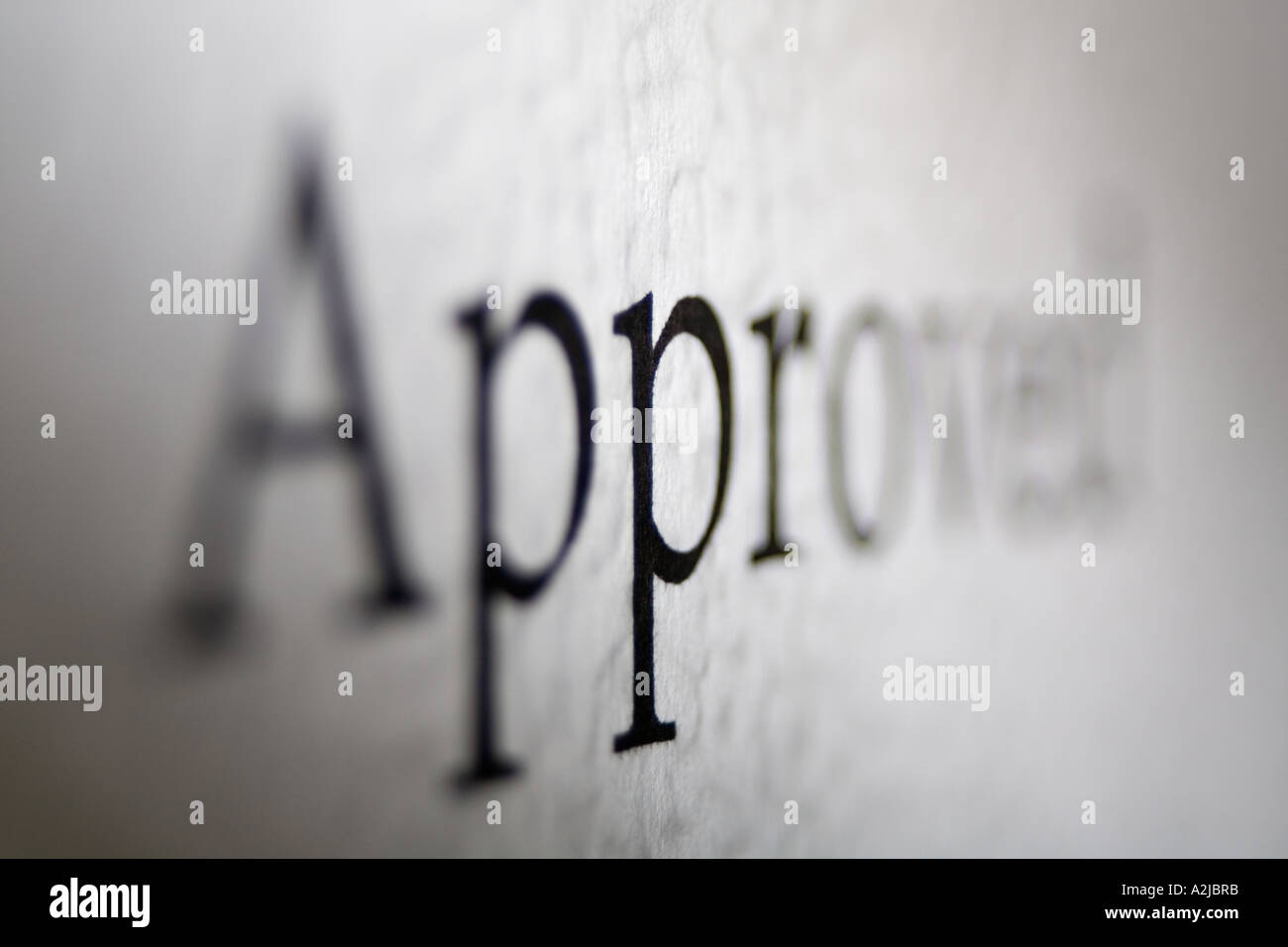 the word approved printed on to texture paper Stock Photo - Alamy