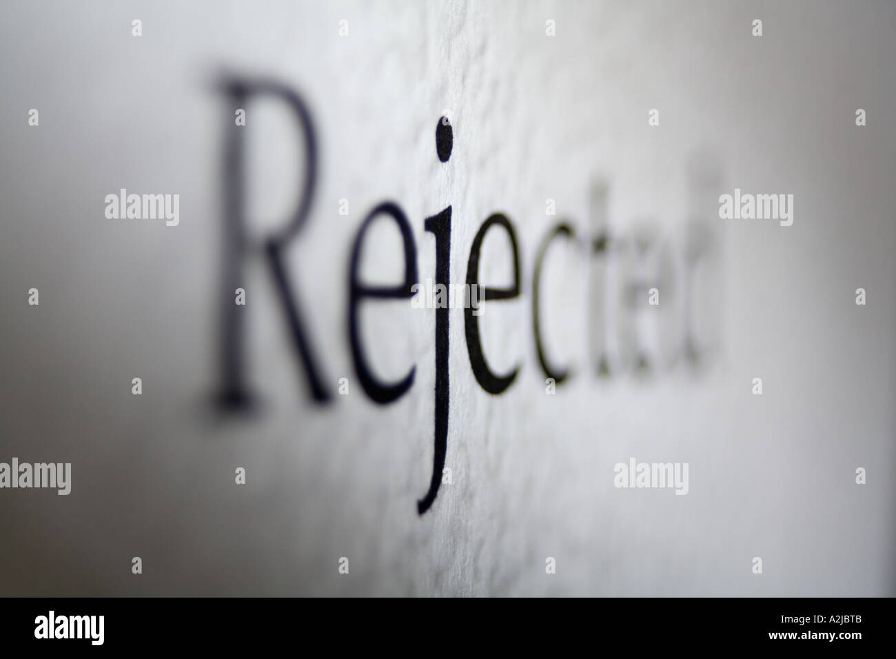 the word rejected printed on to texture paper Stock Photo - Alamy
