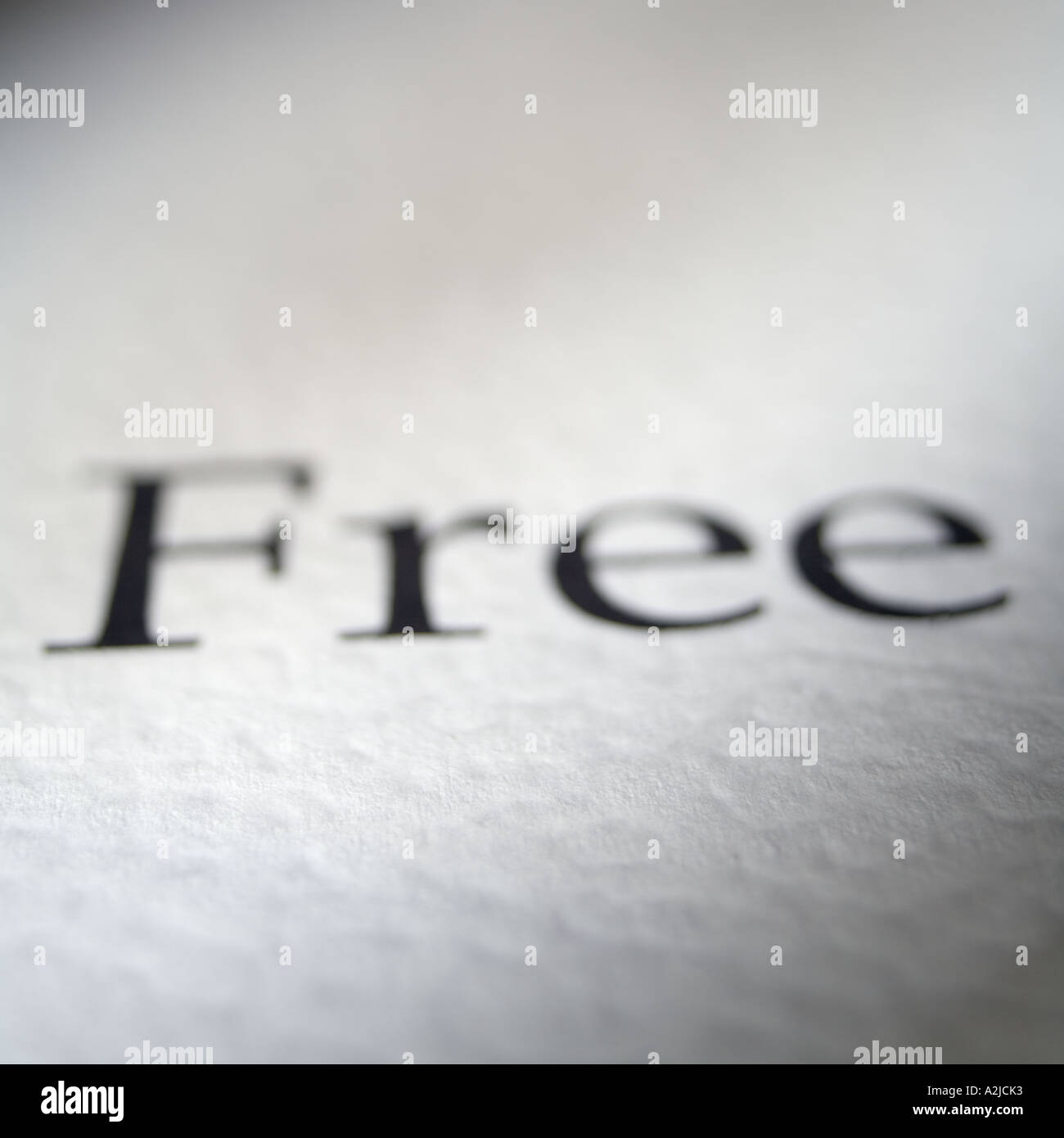 the word free printed on to texture paper Stock Photo - Alamy