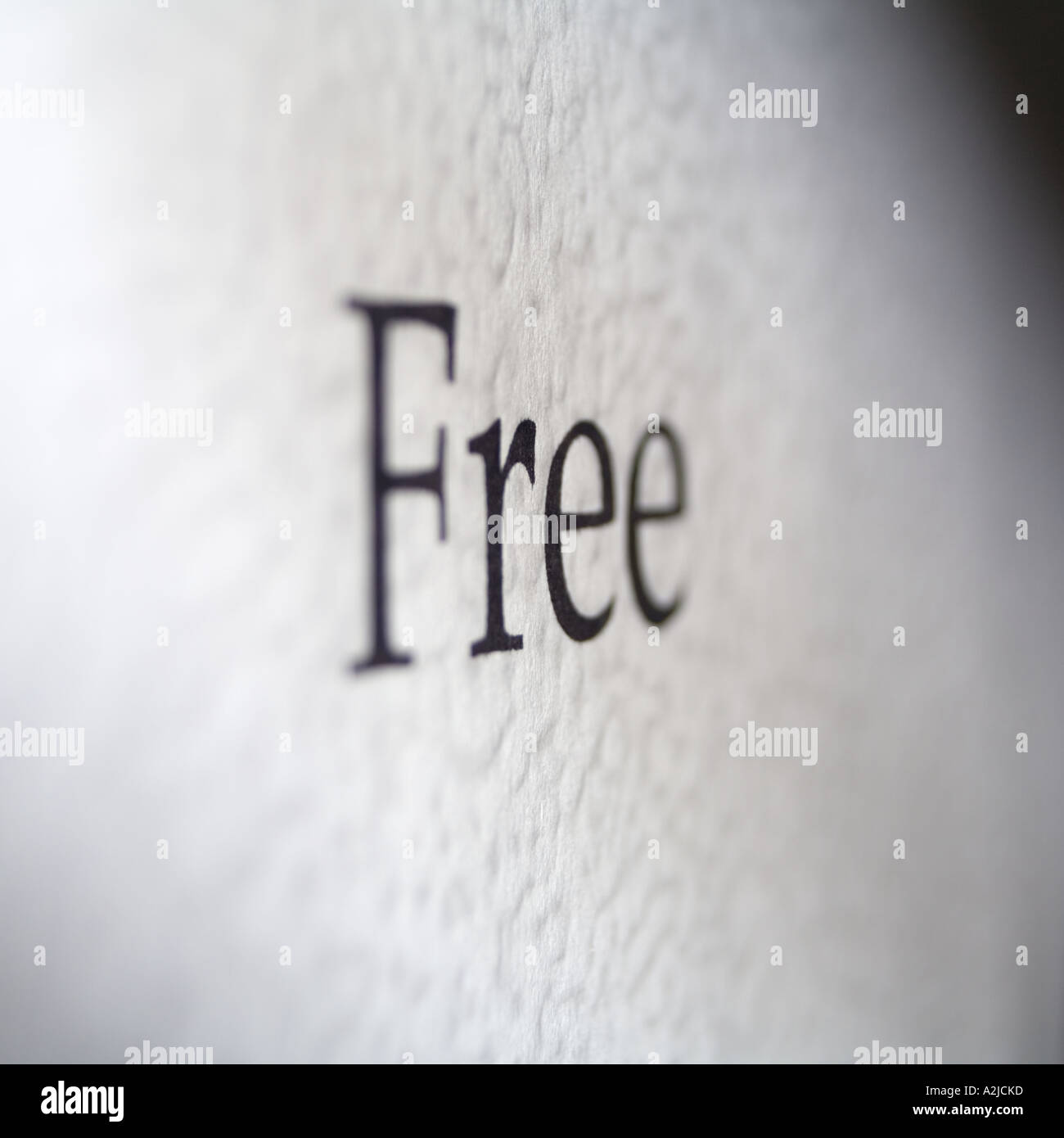 the word free printed on to texture paper Stock Photo - Alamy