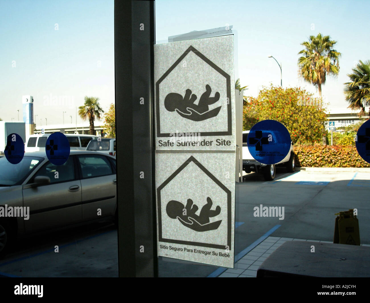 A sign on the window of a Safe Surrender Site, where parents unable to ...