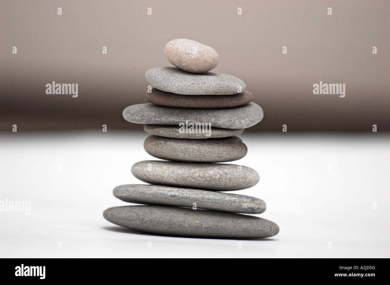 Group of various sized pebbles balanced on top of one another Stock ...