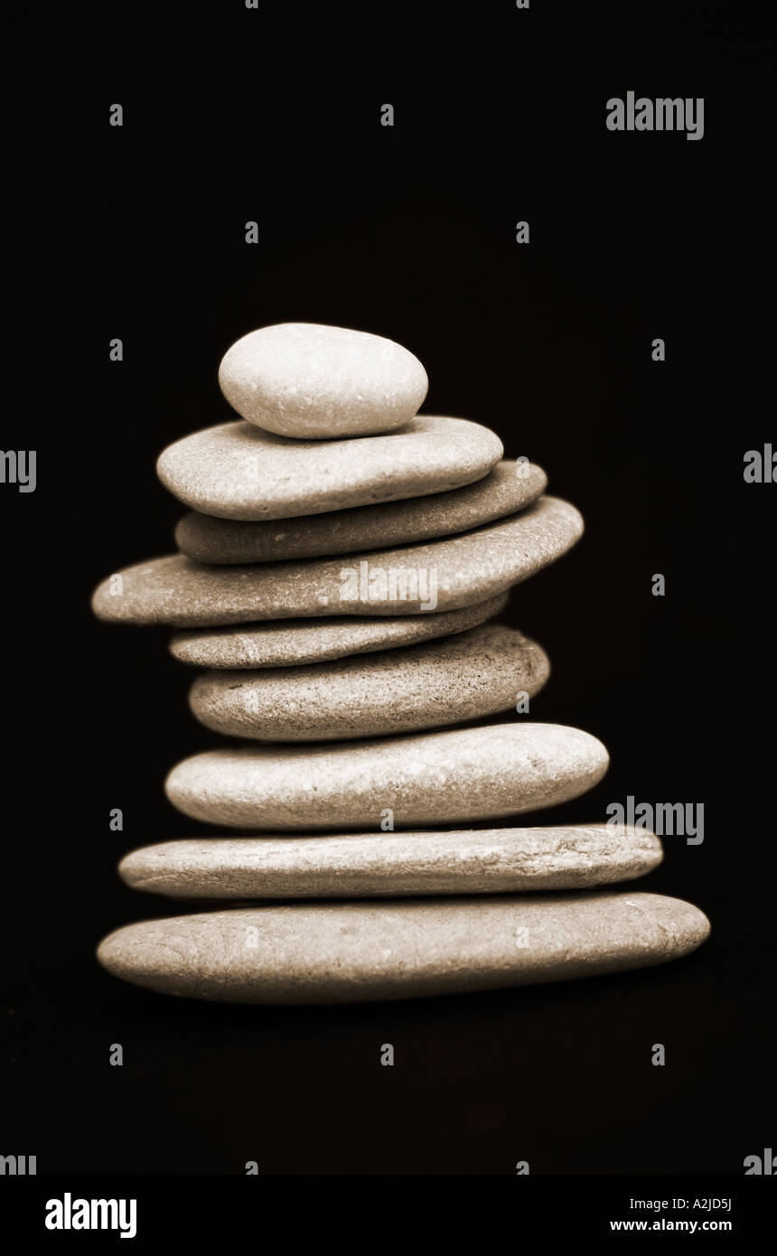 Group of various sized pebbles balanced on top of one another Stock ...