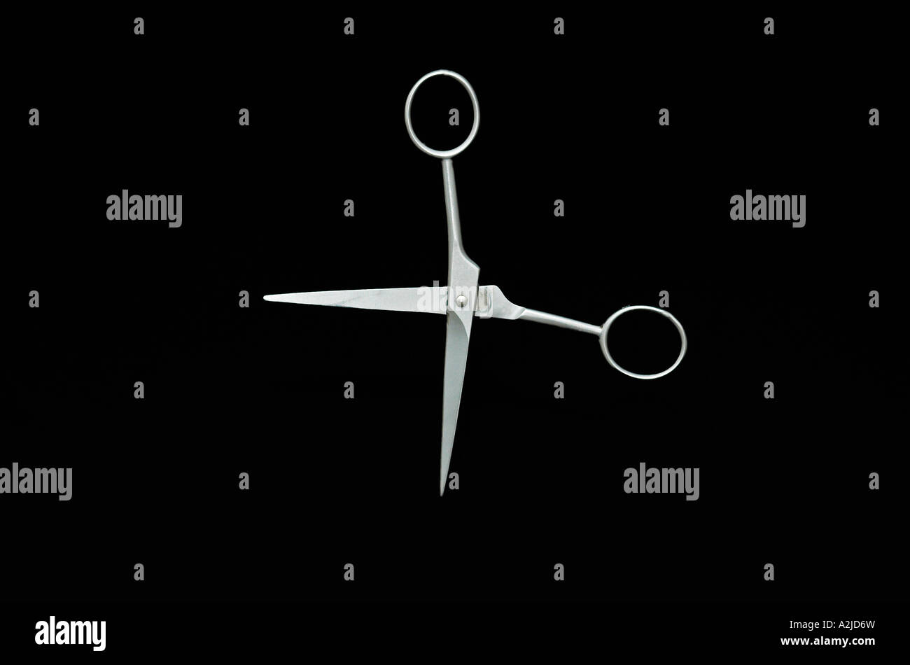 Scissors on black background Stock Photo - Alamy