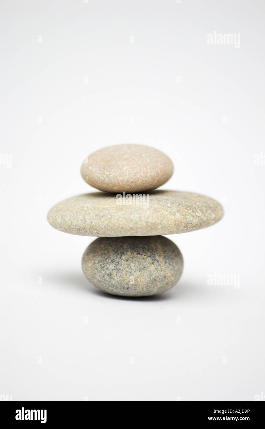 Pebbles on white background Stock Photo - Alamy