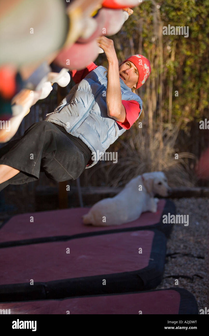Lisa Hathaway climbing on artificail climbing wall Moab Utah Stock ...