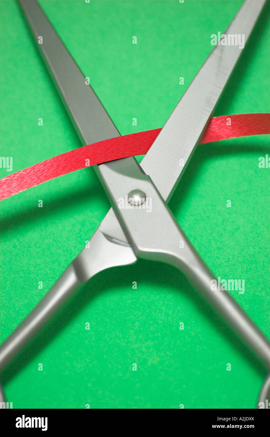 Scissors cutting green ribbon hi-res stock photography and images - Alamy