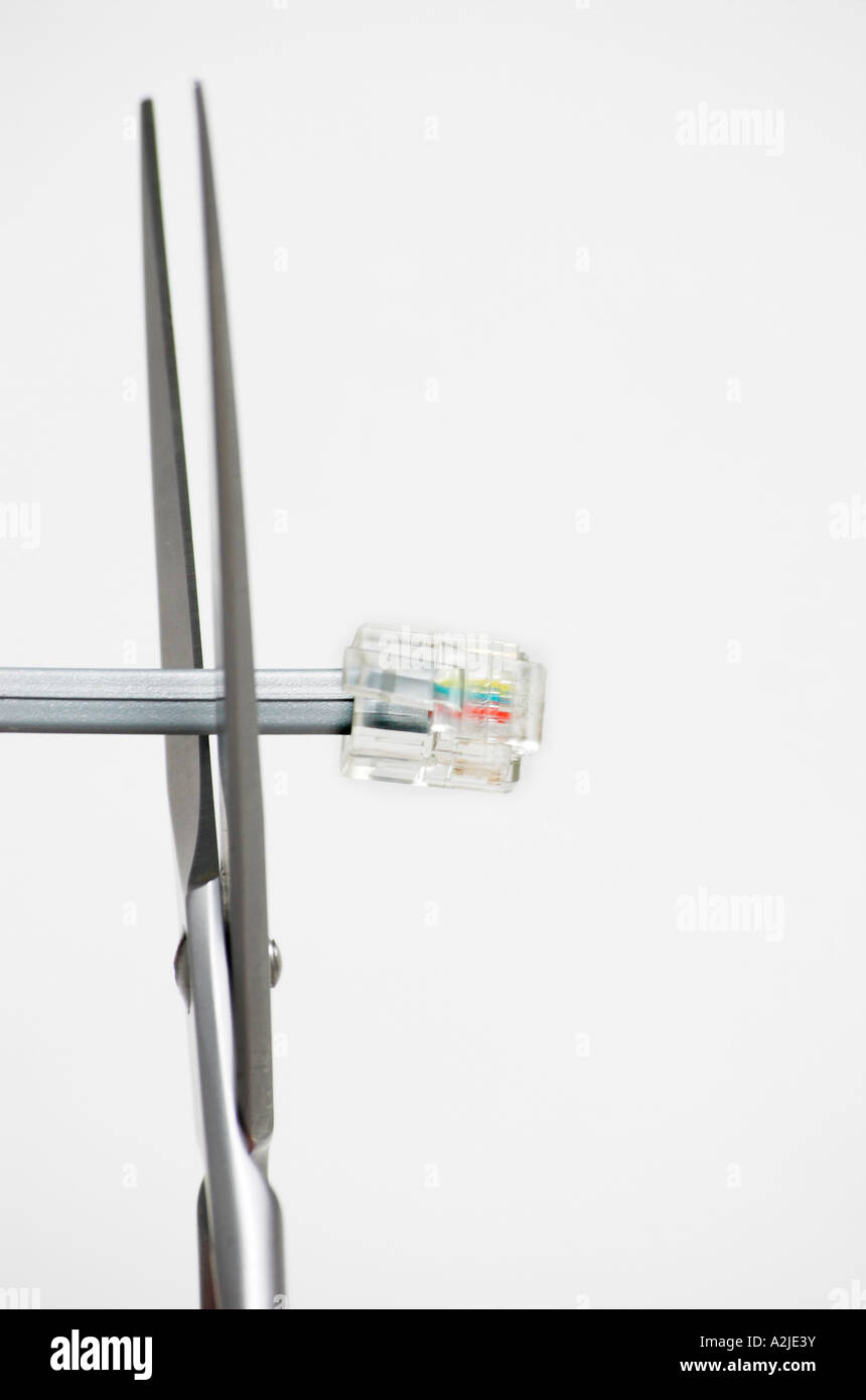 Scissors cutting network connection plug hi-res stock photography and ...