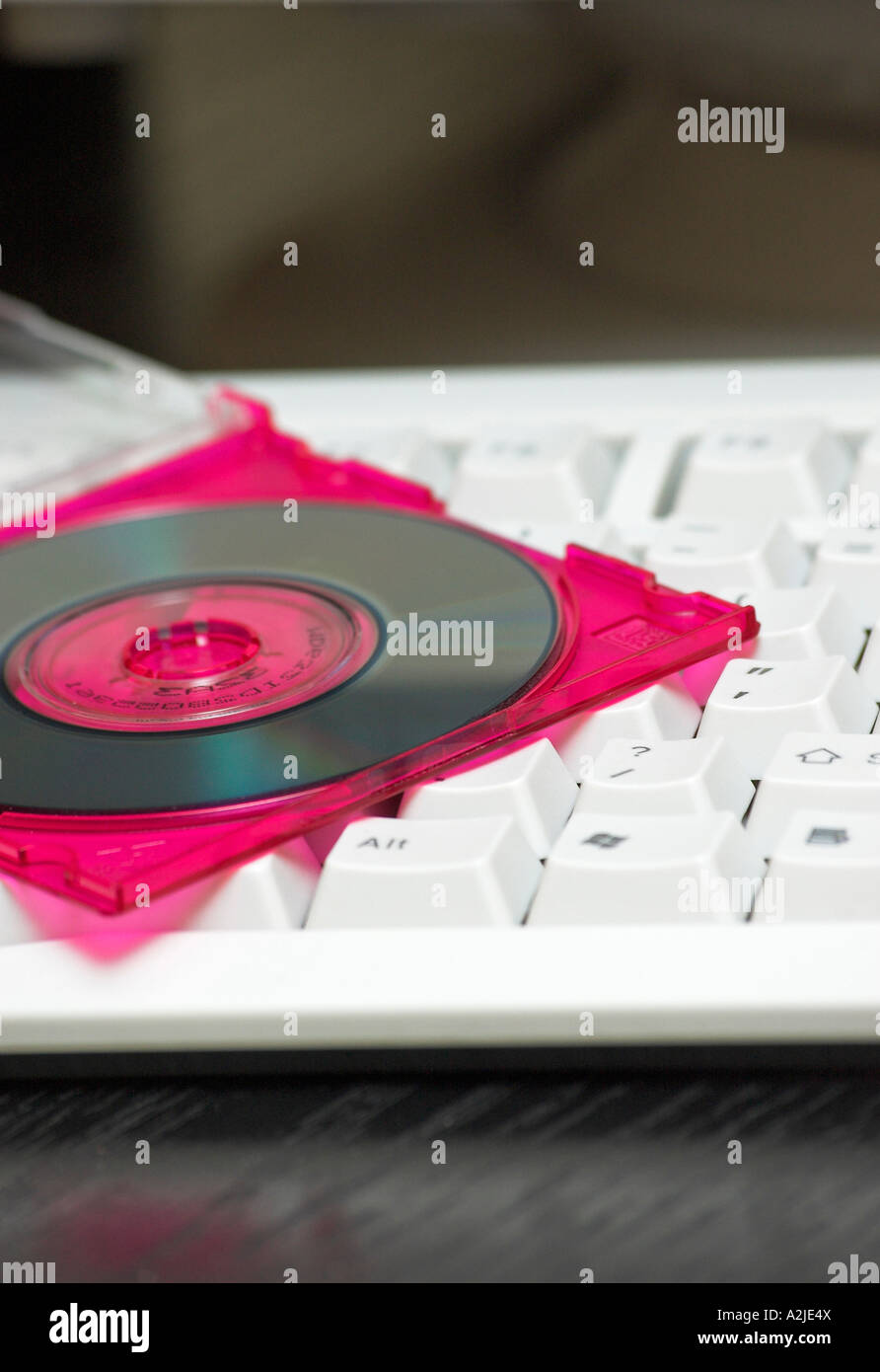 CD on computer keyboard Stock Photo - Alamy