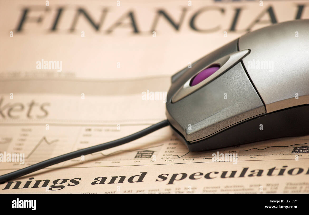 Computer Mouse on Newspaper Stock Photo - Alamy