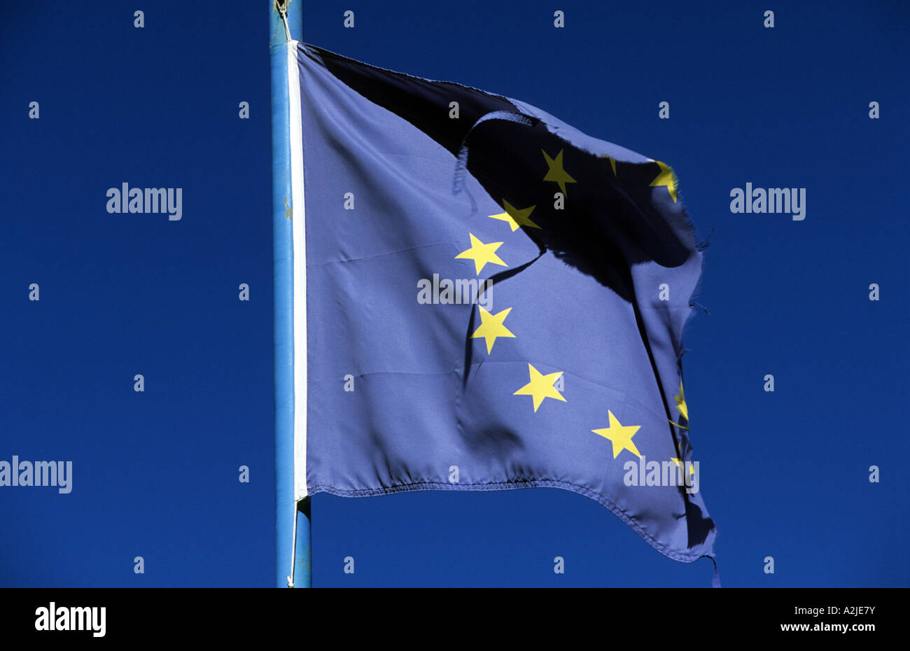 A torn and tattered European Union flag flying in Brussels, Belgium ...