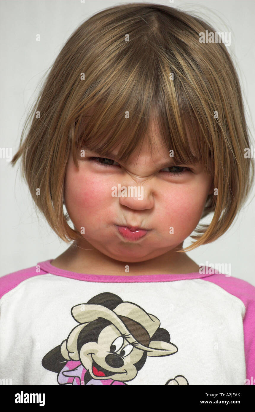 Little Girl Making Face Stock Photo - Alamy