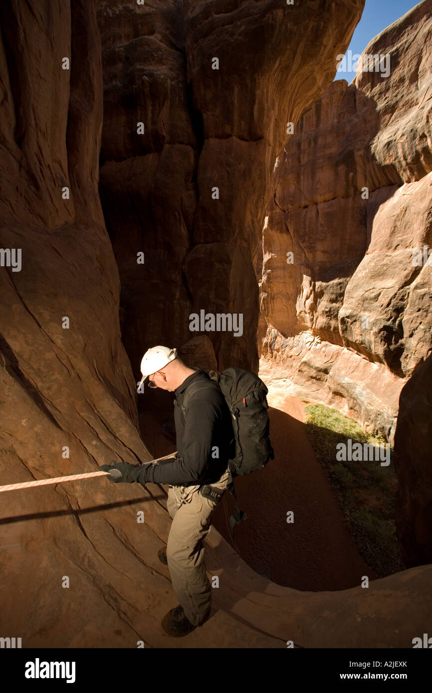 Dallas Golz rappelling Lomatium canyon loop in the Fiery Furnace area ...