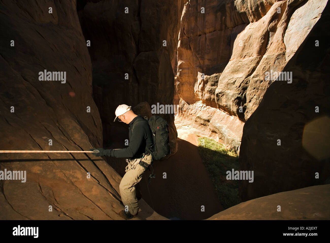 Dallas Golz rappelling Lomatium canyon loop in the Fiery Furnace area ...