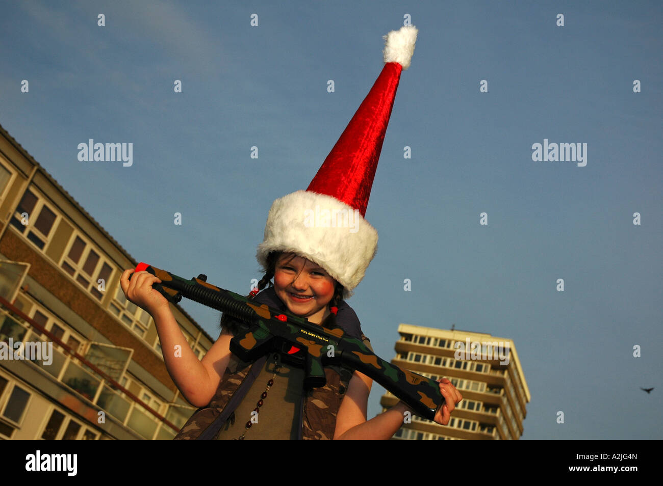 Santa with gun hi-res stock photography and images - Alamy
