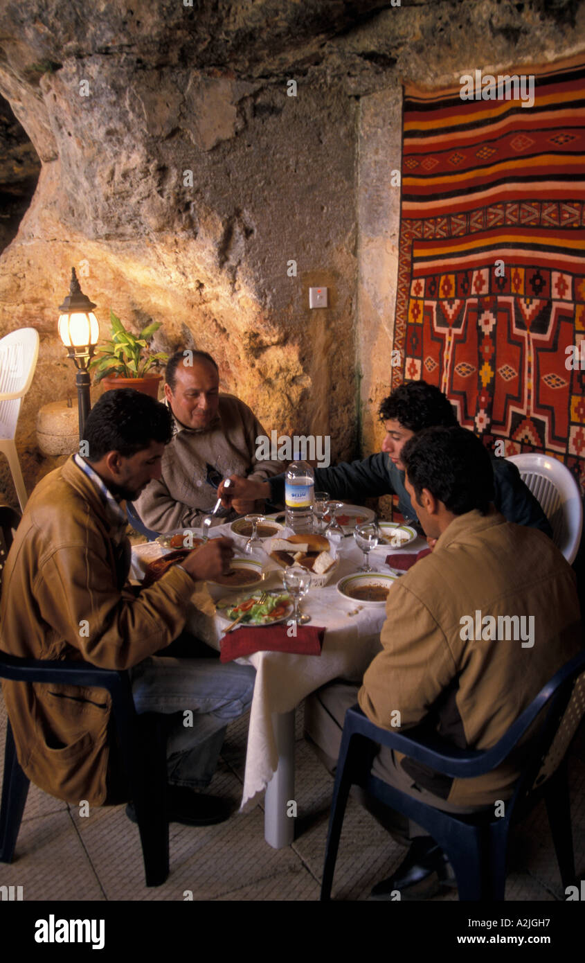 Africa, Libya, Cyrene, patrons at cave restaurant Stock Photo - Alamy