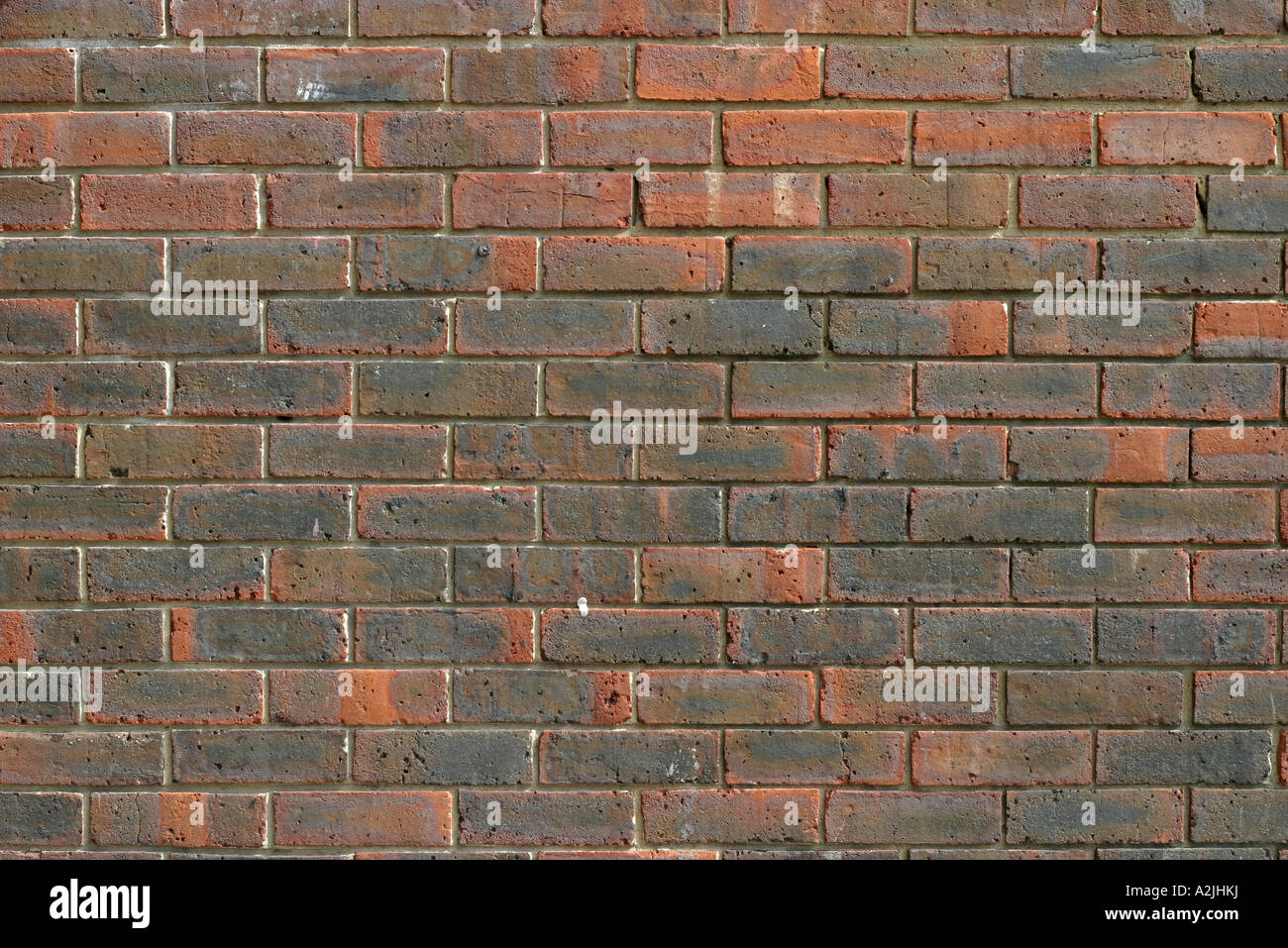 A brick wall showing the square geometrical pattern Stock Photo - Alamy
