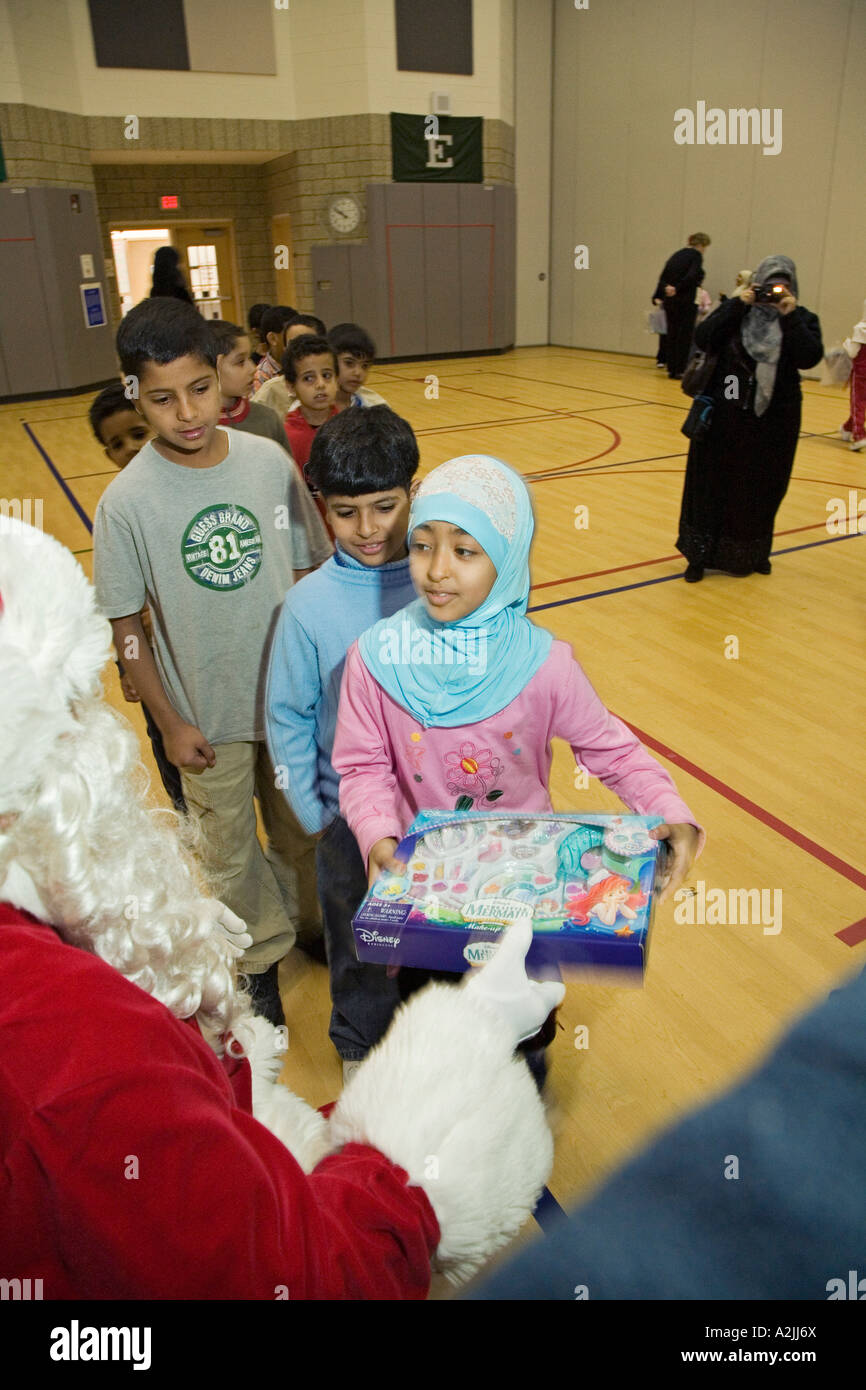 Santa Visits Muslim Immigrant Children Stock Photo - Alamy