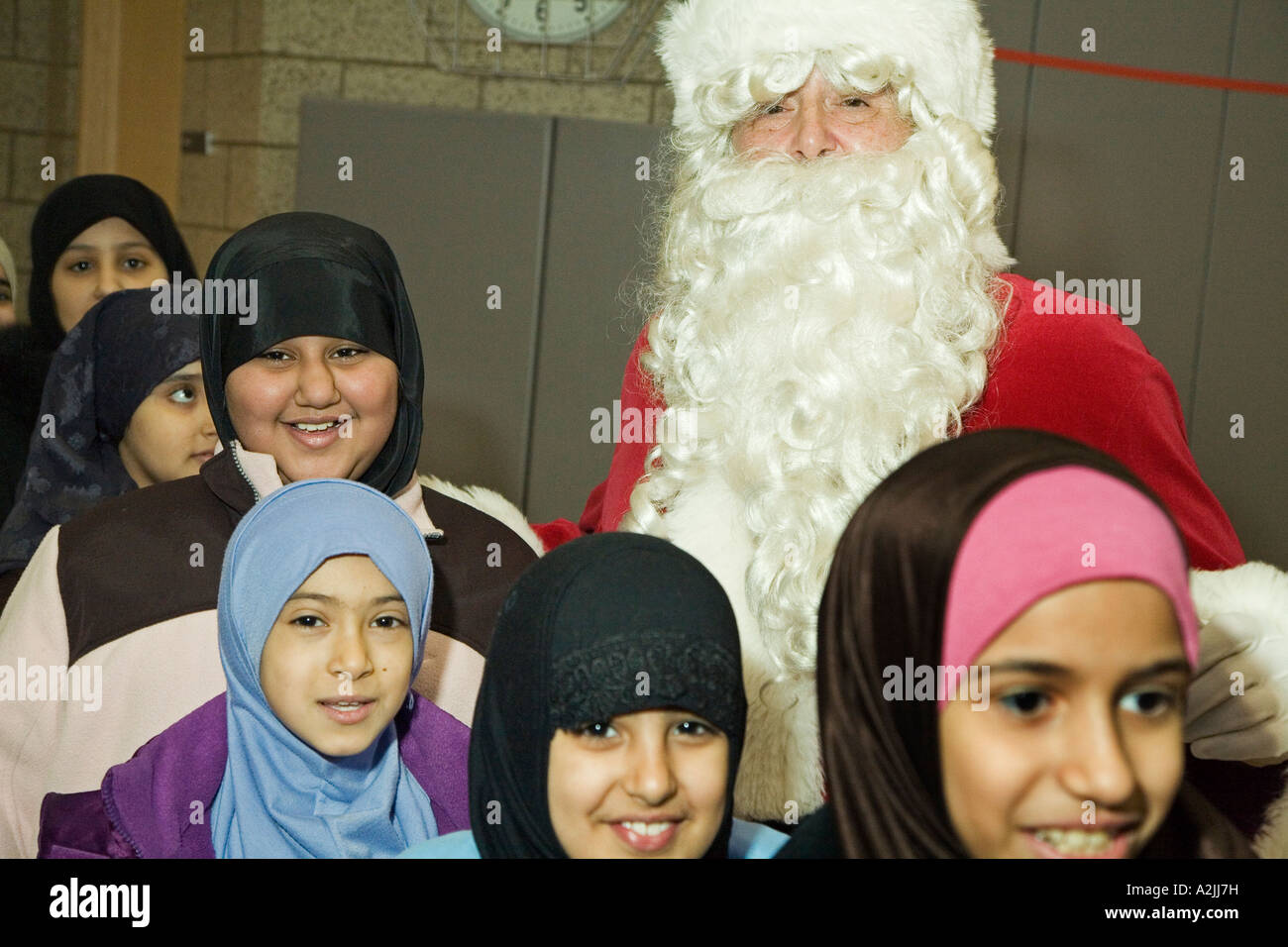 Santa Visits Muslim Immigrant Children Stock Photo - Alamy