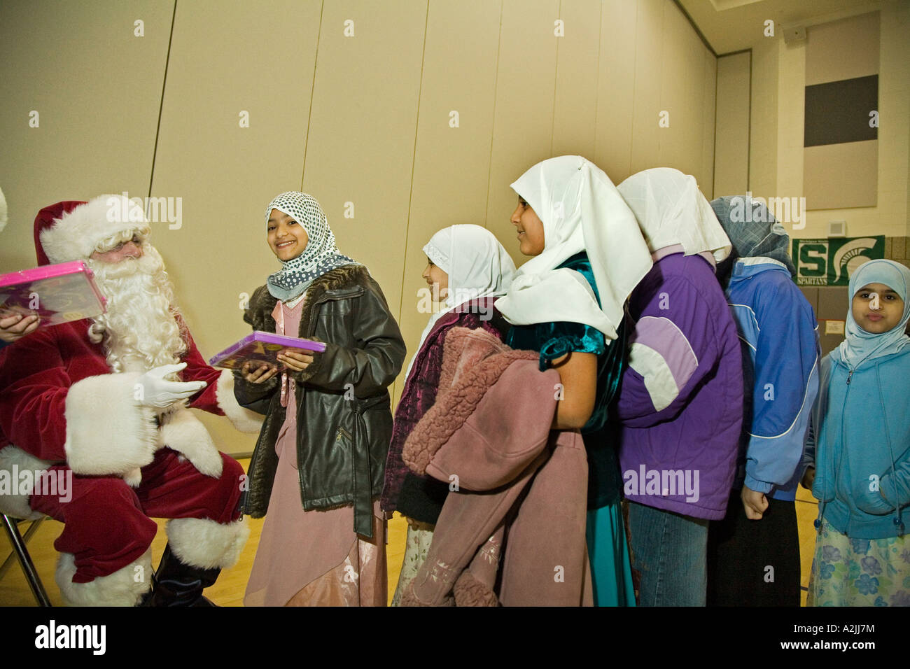 Santa Visits Muslim Immigrant Children Stock Photo - Alamy