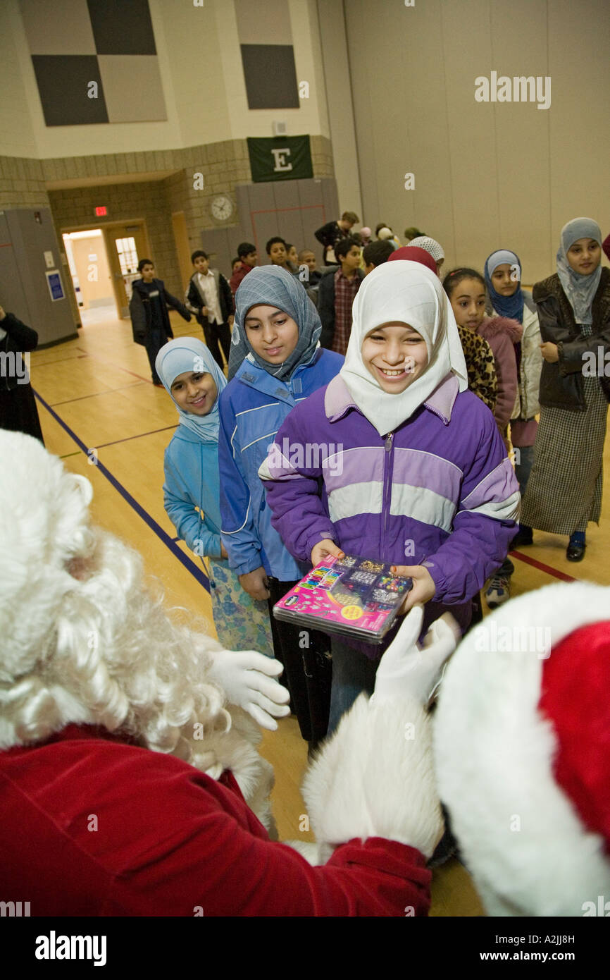 Santa Visits Muslim Immigrant Children Stock Photo - Alamy