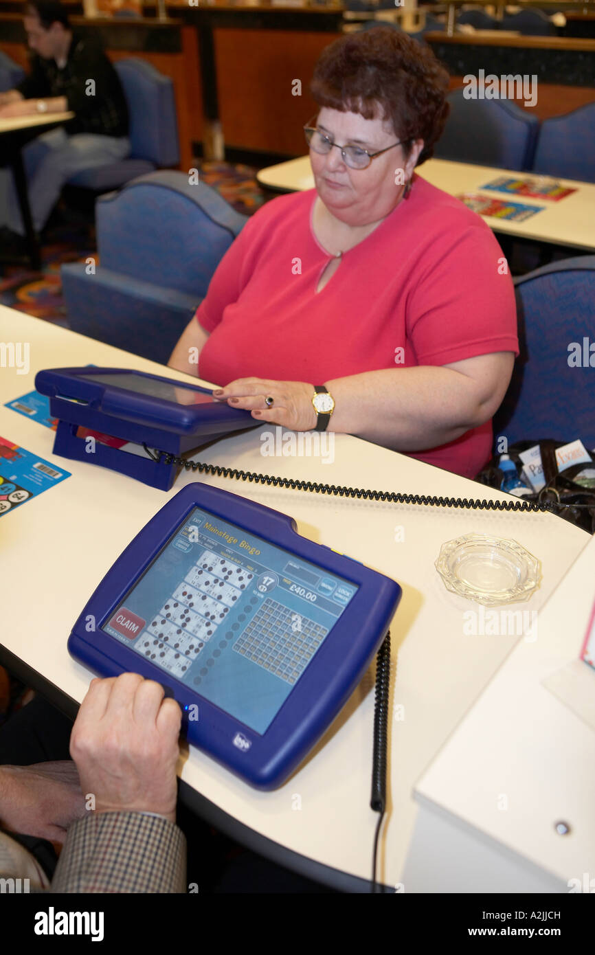 Woman playing bingo on a new electronic board East Yorkshire England UK ...