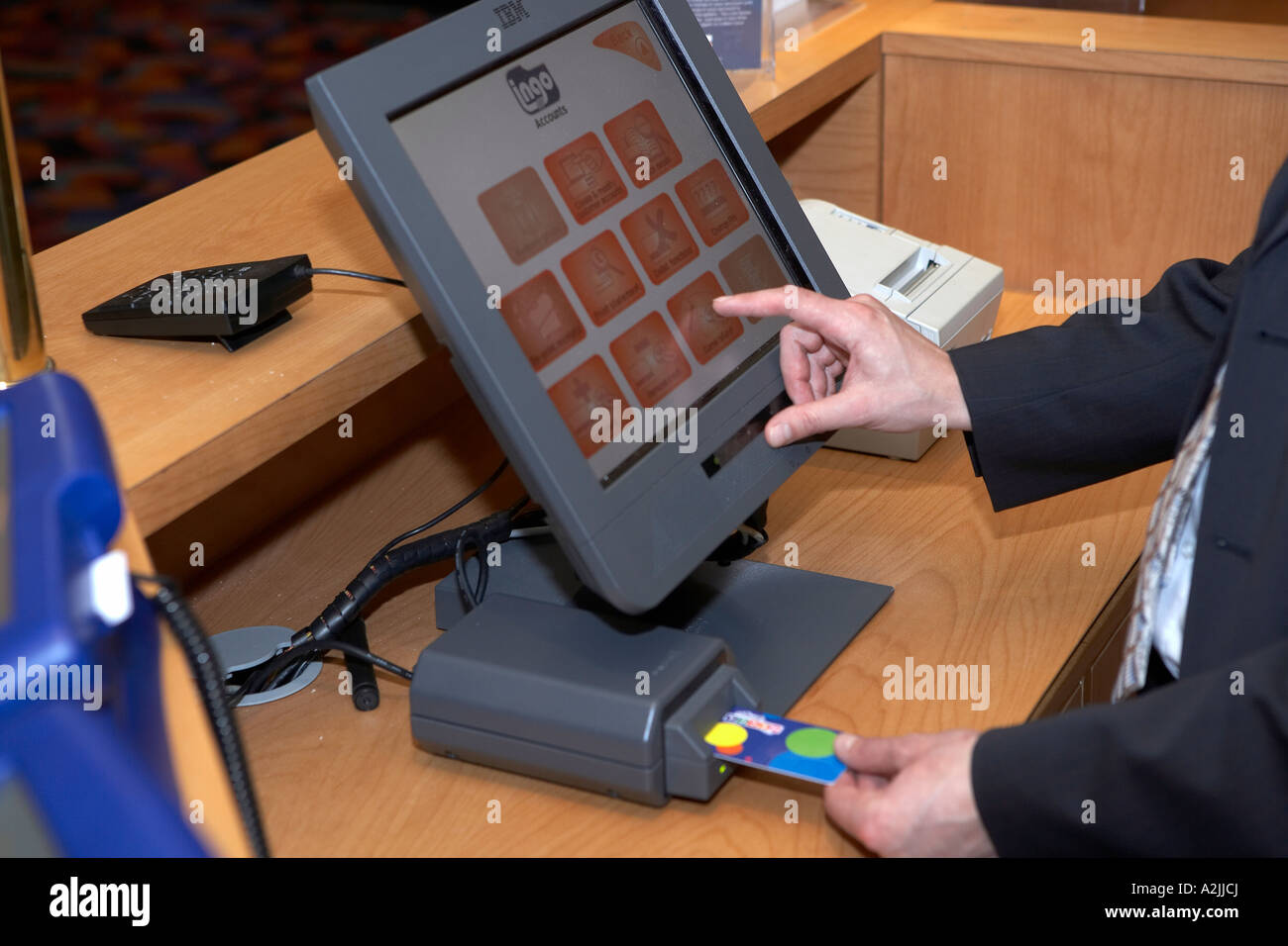 Hand putting a identity card into a computer Stock Photo - Alamy