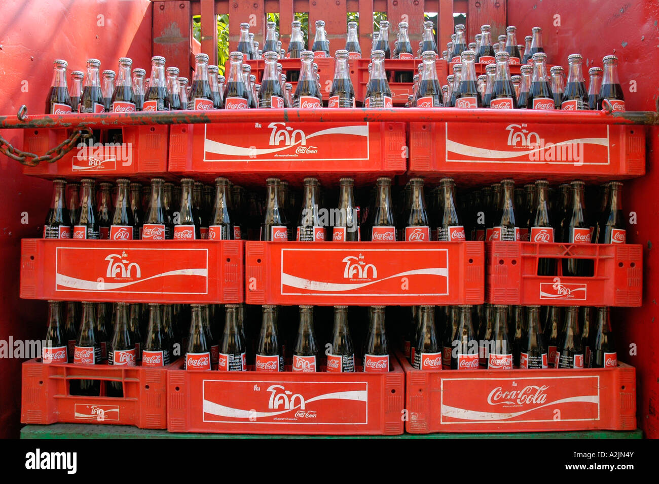 Racks of Coca Cola on back of truck, Thailand Stock Photo - Alamy