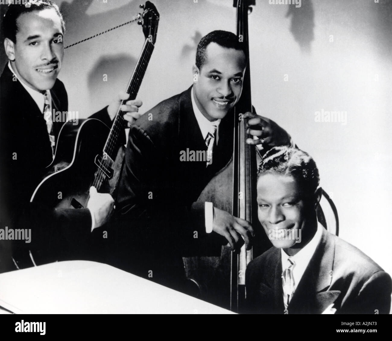 NAT KING COLE TRIO with Nat on piano before he went solo as a singer ...