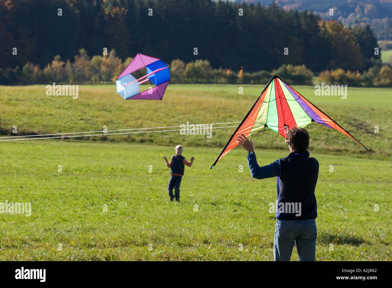 MR woman and boy flying a kite Bavaria Germany Stock Photo - Alamy