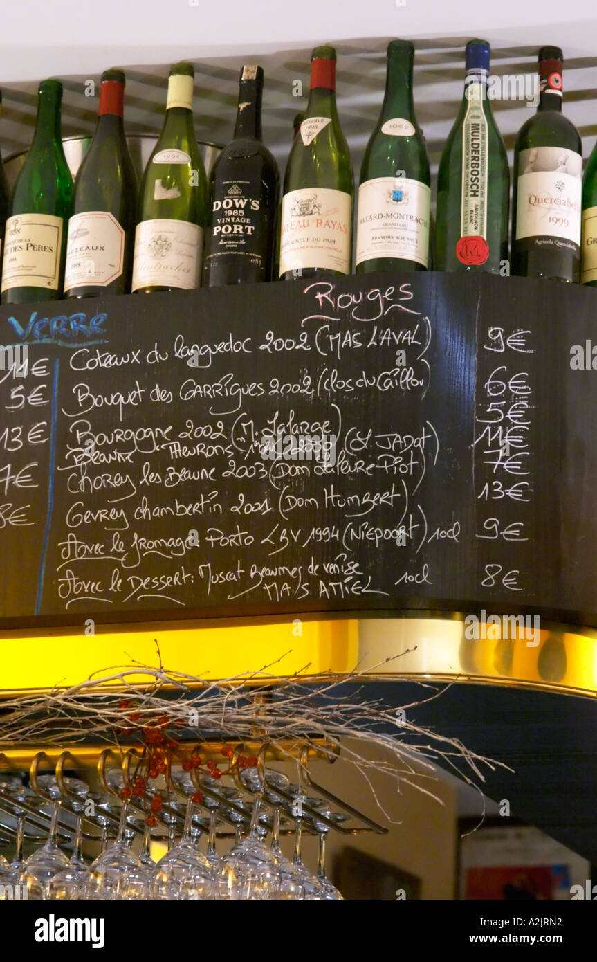 A blackboard chalkboard black chalk board with the wine list with wines ...