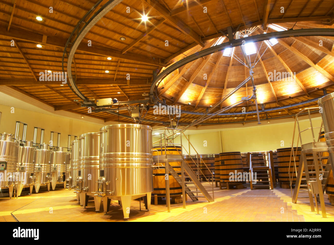 The winery with wooden and stainless steel fermentation vats. It is ...