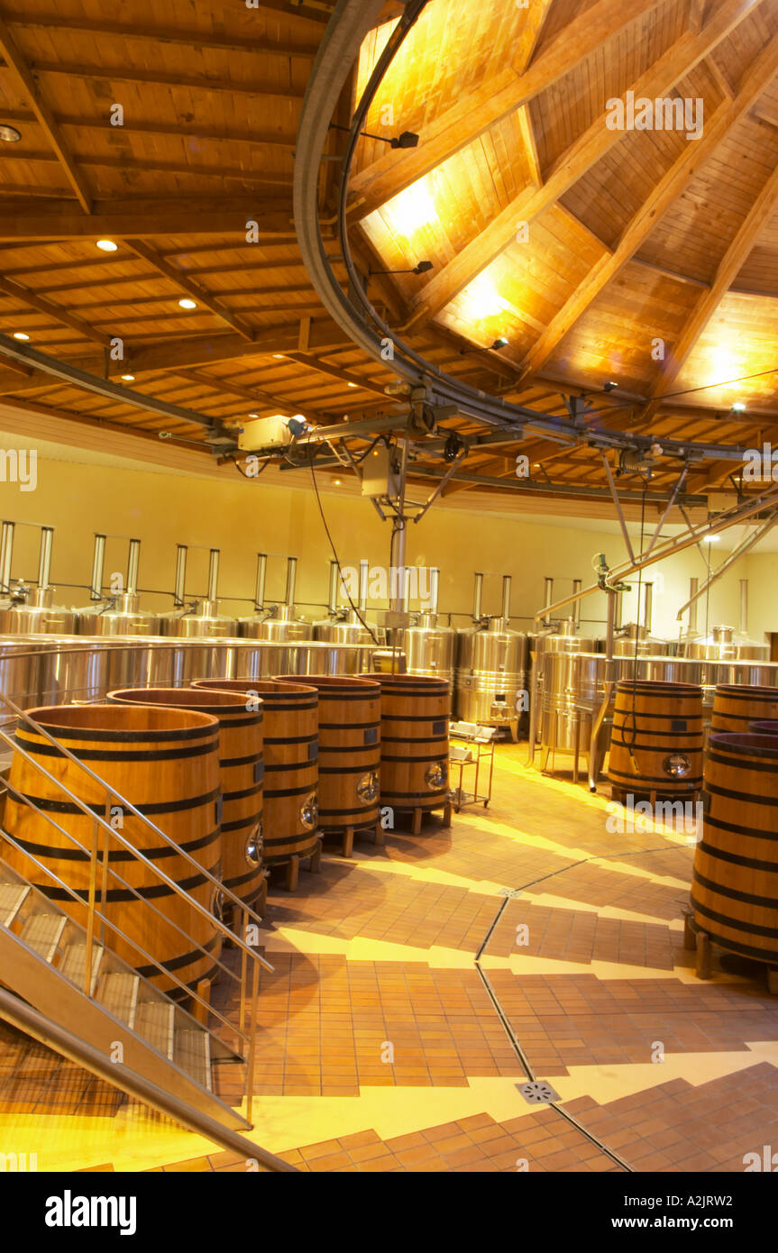 The winery with wooden and stainless steel fermentation vats. It is ...