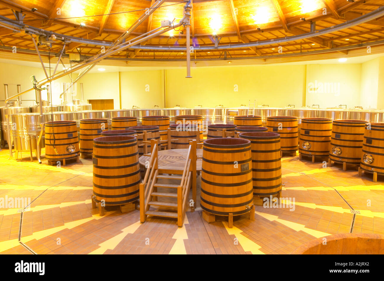 The winery with wooden and stainless steel fermentation vats. It is ...