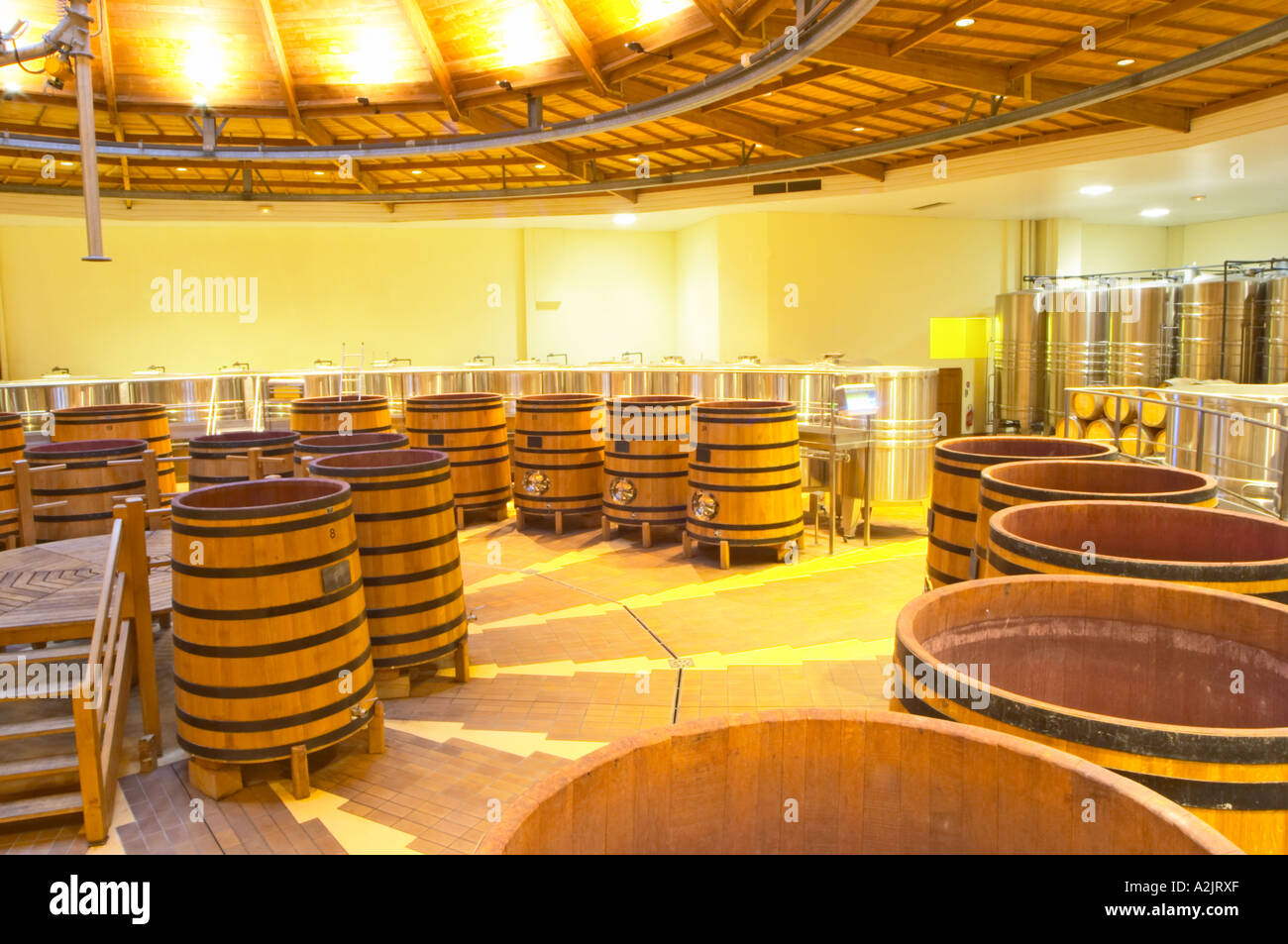 The winery with wooden and stainless steel fermentation vats. It is ...
