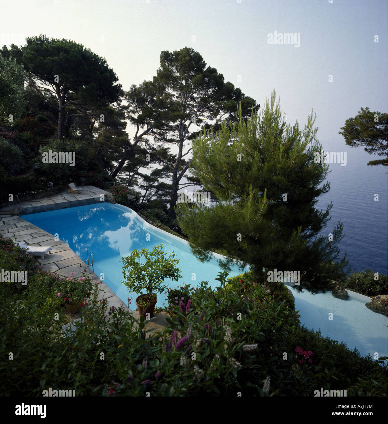Aerial view of infinity swimmingpool above Italian coast Stock Photo ...