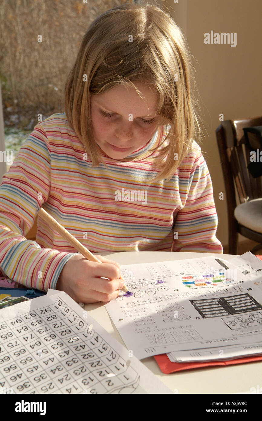 child does homework Stock Photo - Alamy