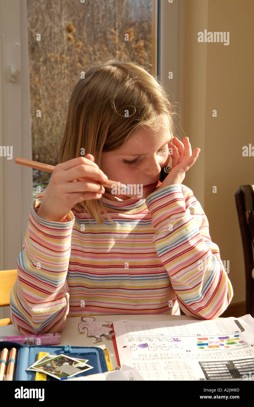 child does homework Stock Photo - Alamy