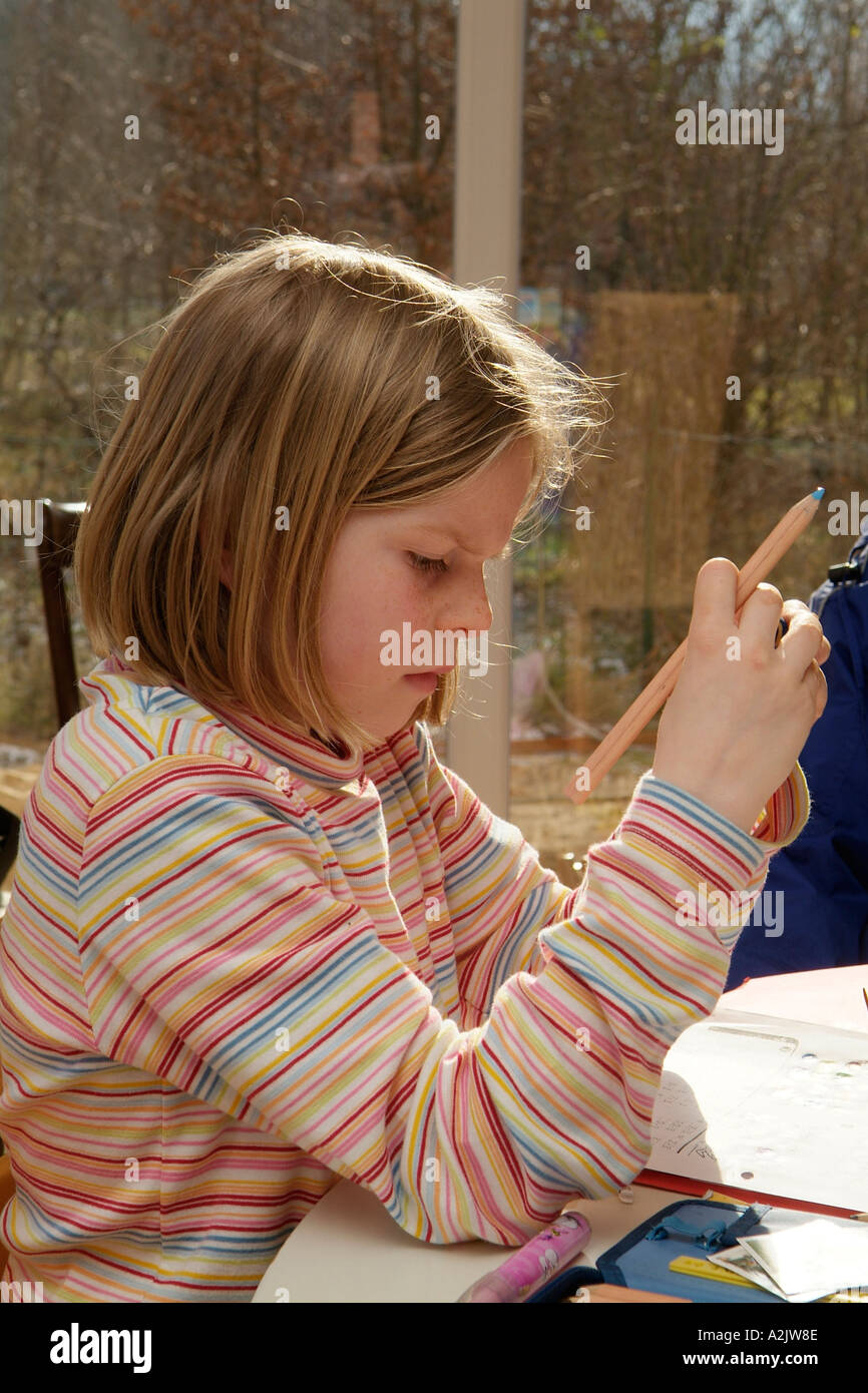 child does homework Stock Photo - Alamy