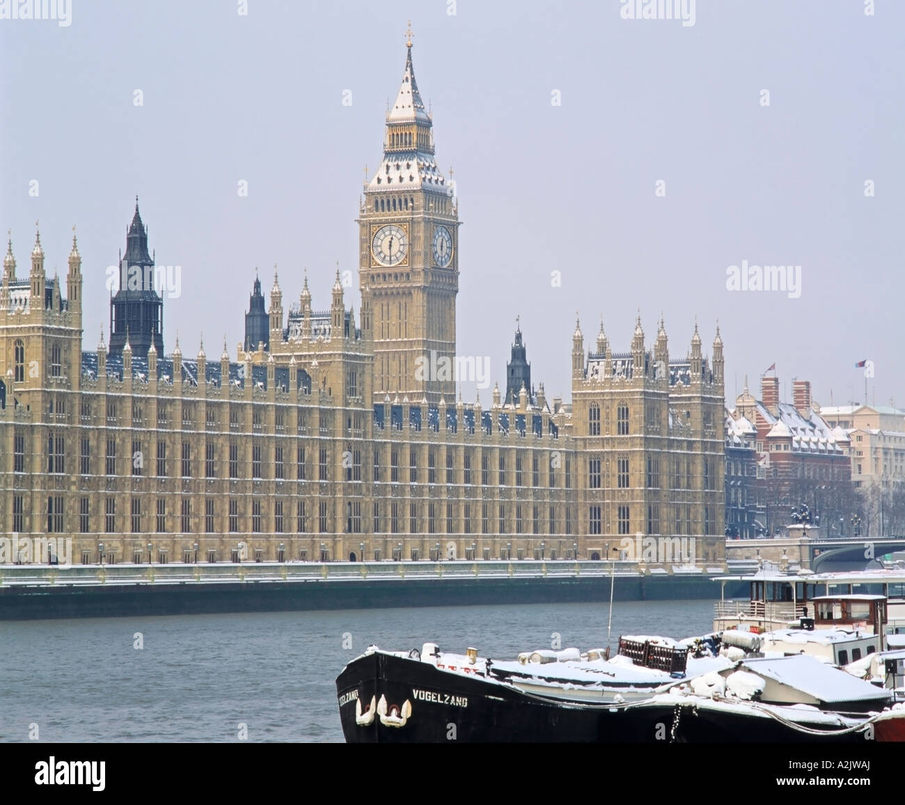 Snow covered winter scene of Big Ben and the Houses of Parliament and ...